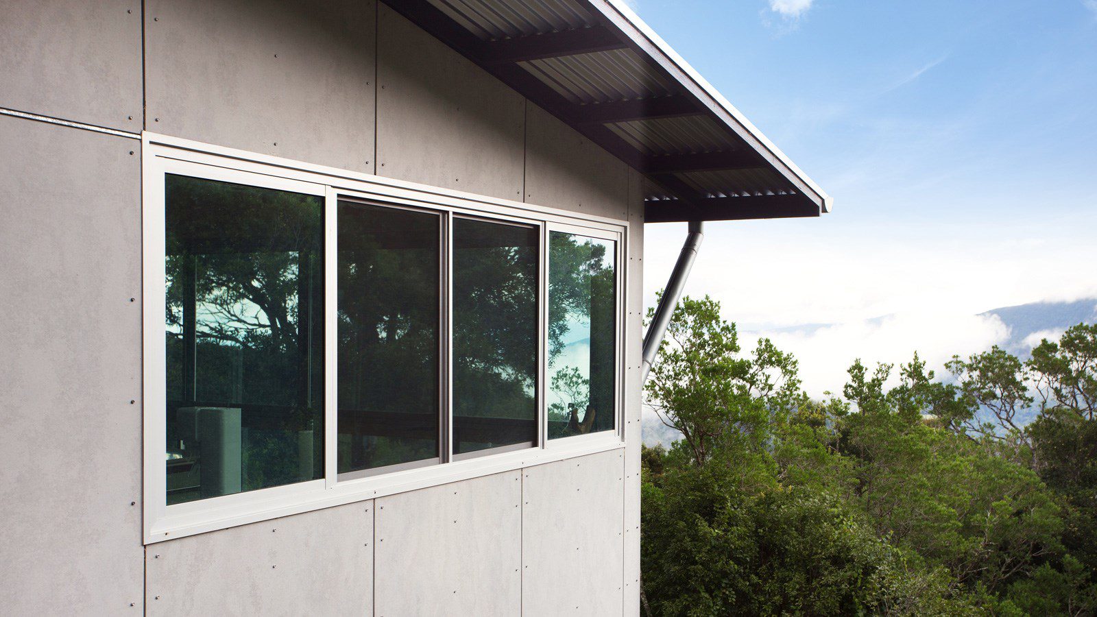 Award-winning rainforest house with Barestone - Case Studies | Cemintel